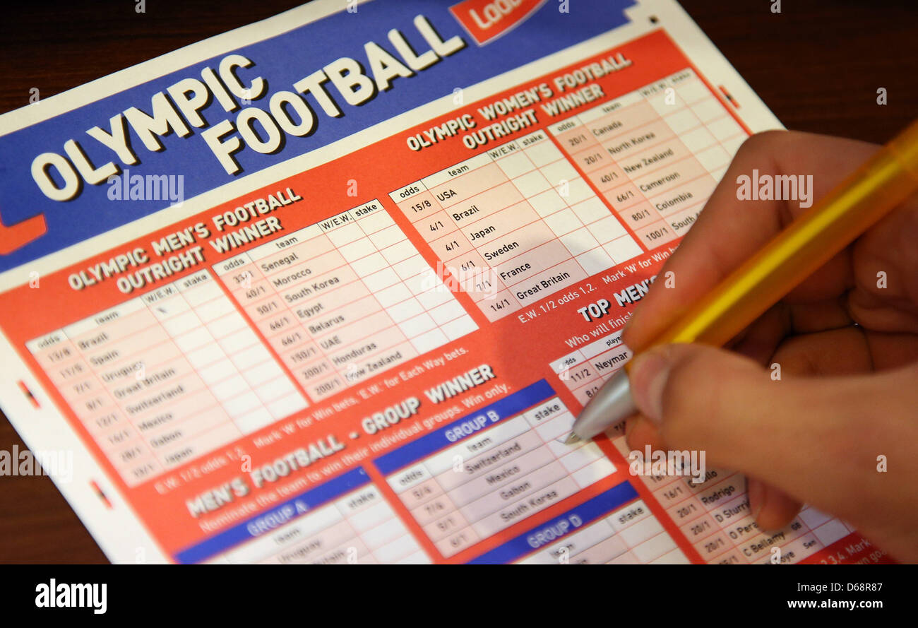 ILLUSTRATION - A client fills out a betting ticket for the Olympic ...