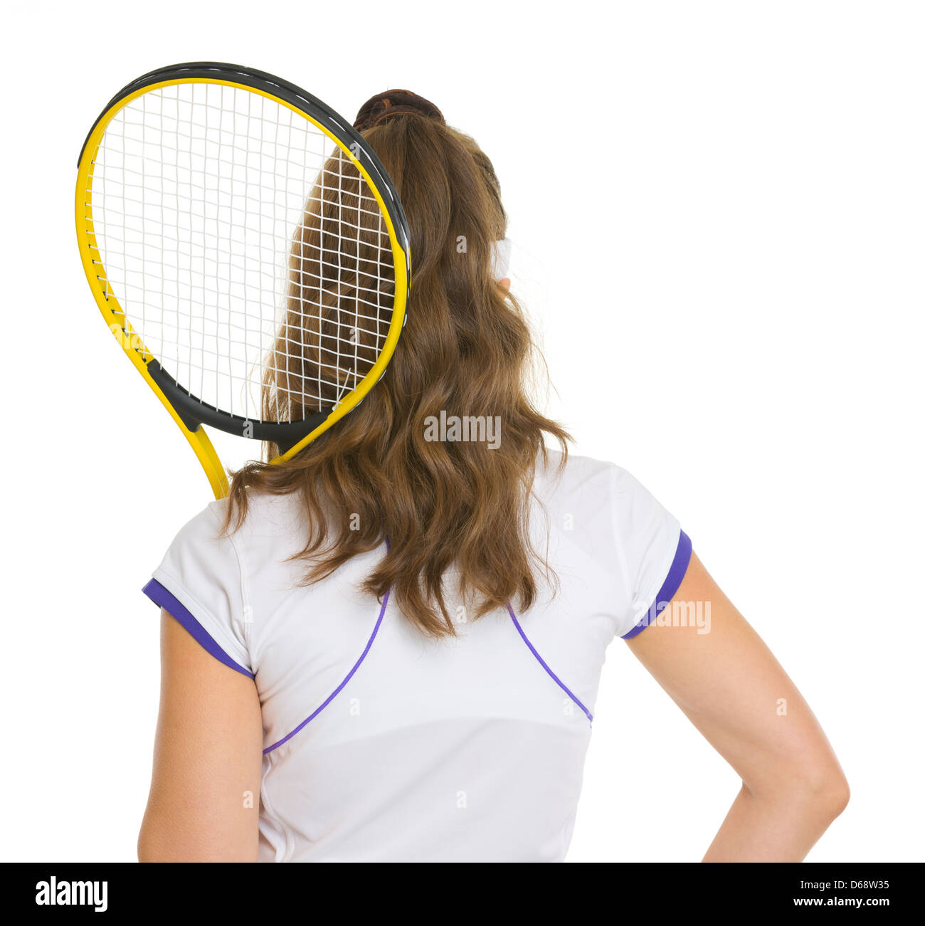 Female tennis player with racket . rear view Stock Photo - Alamy