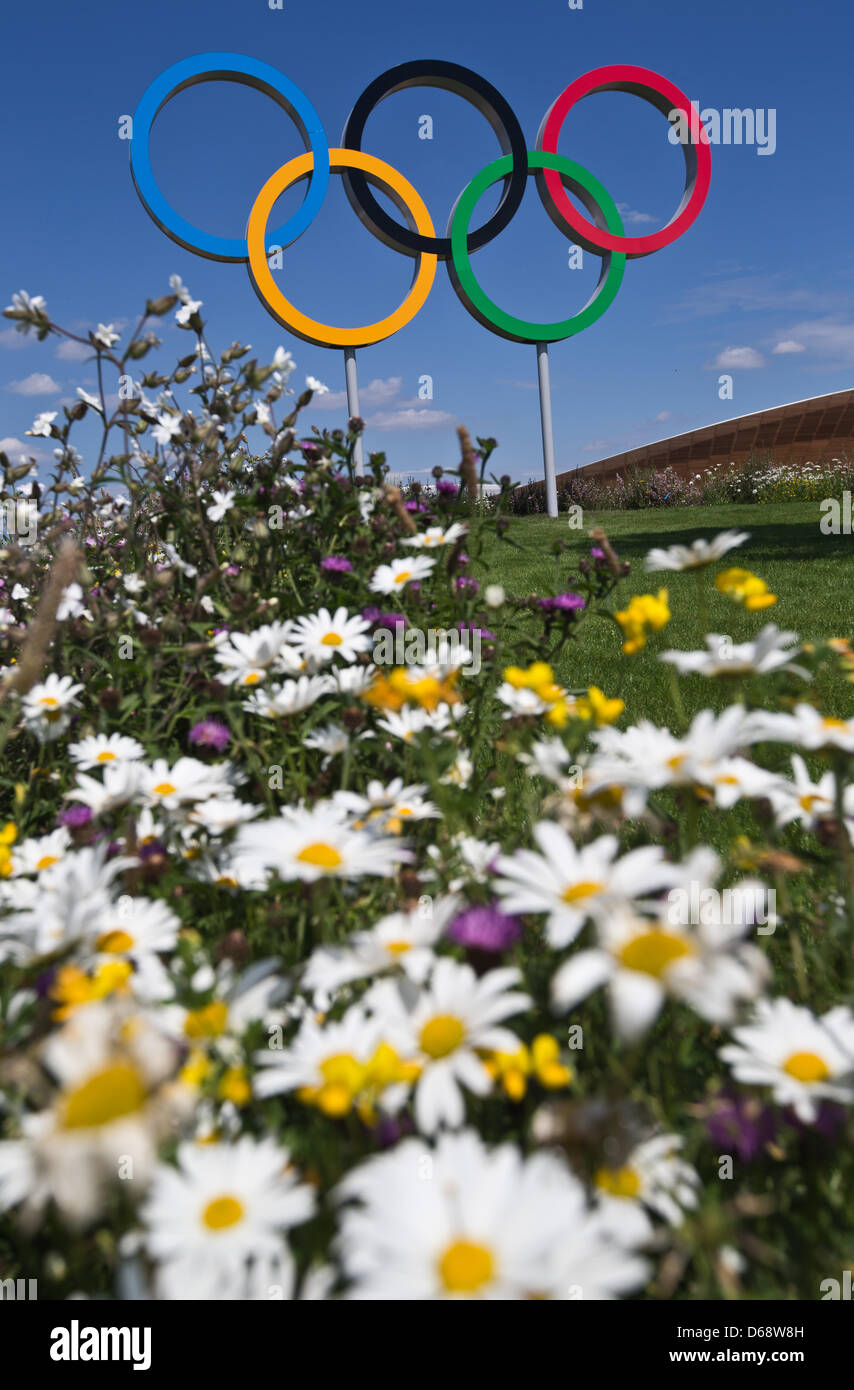 The Olympic rings are seen next to the Velodrome in the Olympic park in ...
