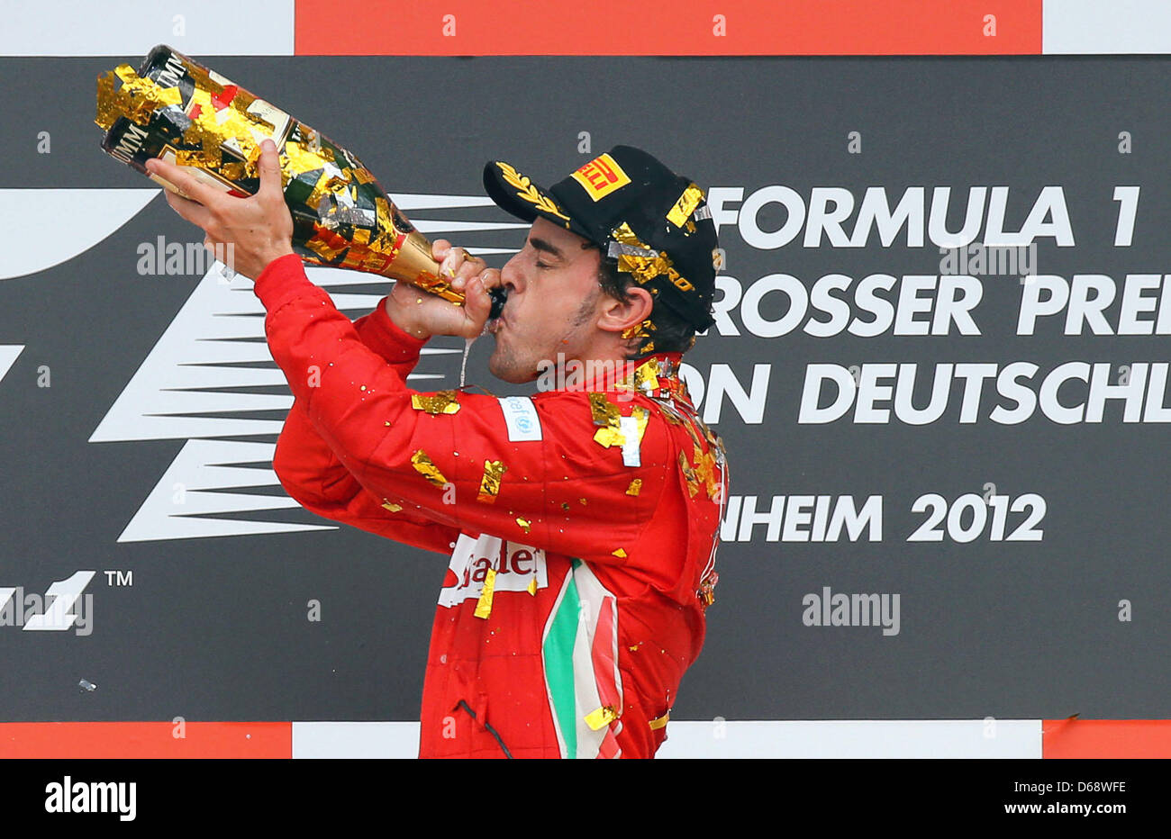 Spanish Formula One driver Fernando Alonso of Ferrari celebrates on the ...