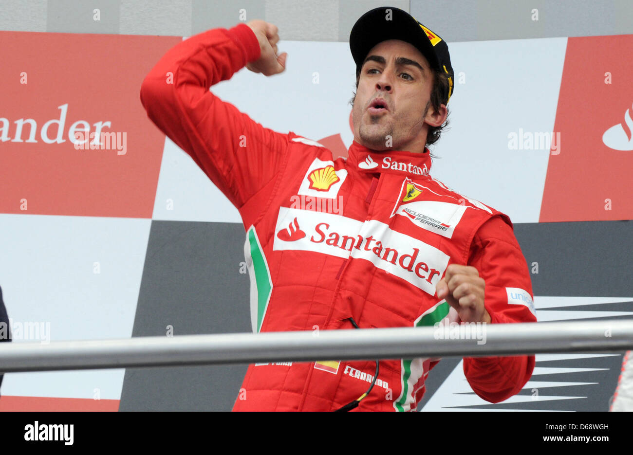 Spanish Formula One driver Fernando Alonso of Ferrari celebrates on the ...