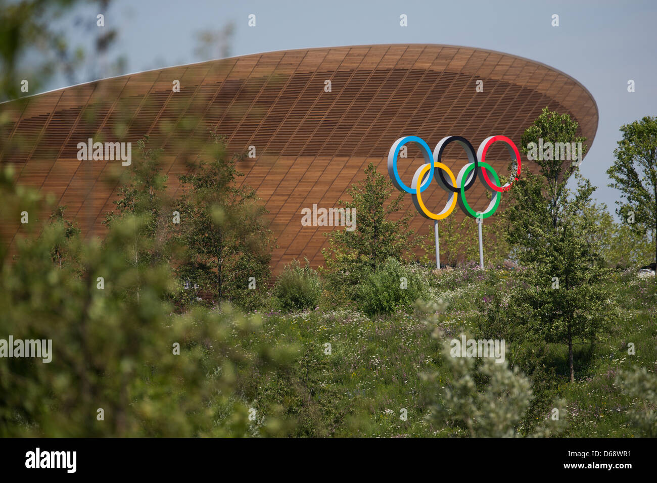 The Olympic rings are seen next to the Velodrome in the Olympic park in ...