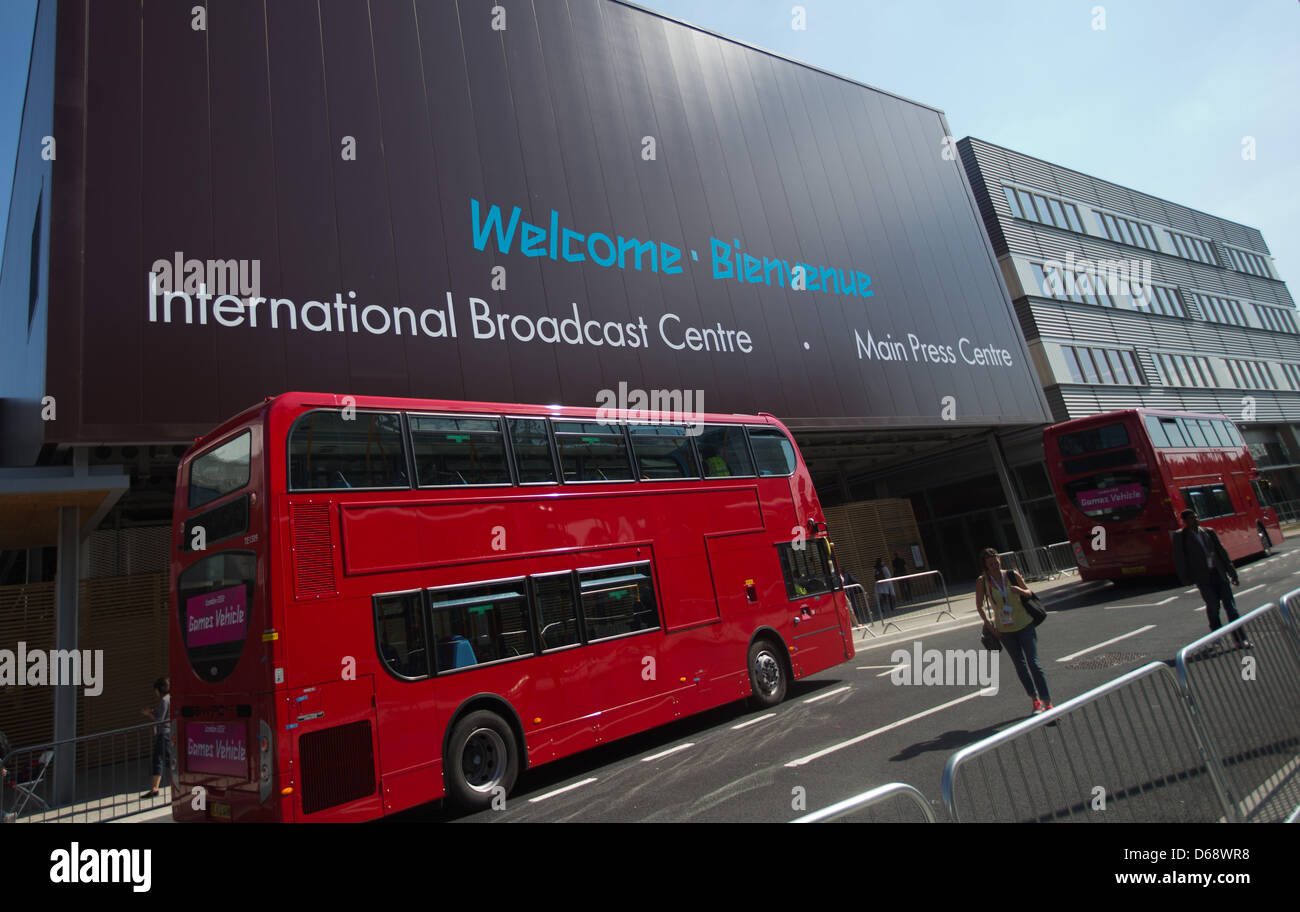 The media shuttle, a London Routemaster Olympic bus, drives past the ...