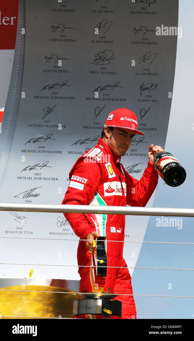 Spanish Formula One driver Fernando Alonso of Ferrari celebrates on the ...