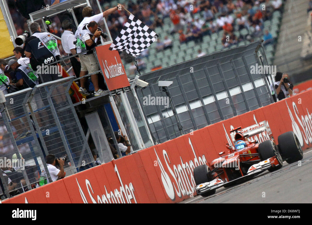 Spanish Formula One driver Fernando Alonso of Ferrari passes the ...