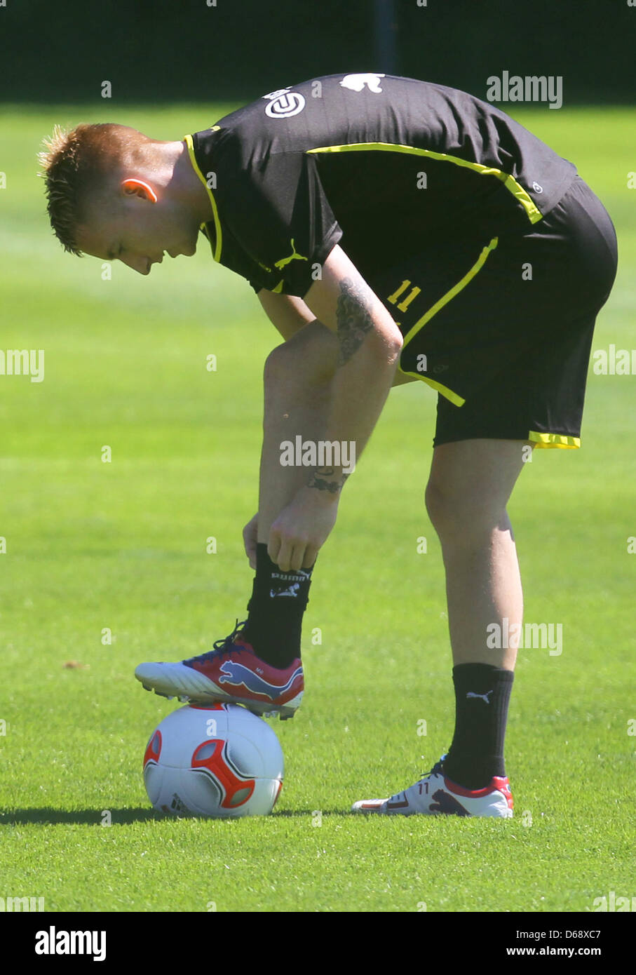 Player of Bundesliga soccer club Borussia Dortmund Marco Reus takes ...