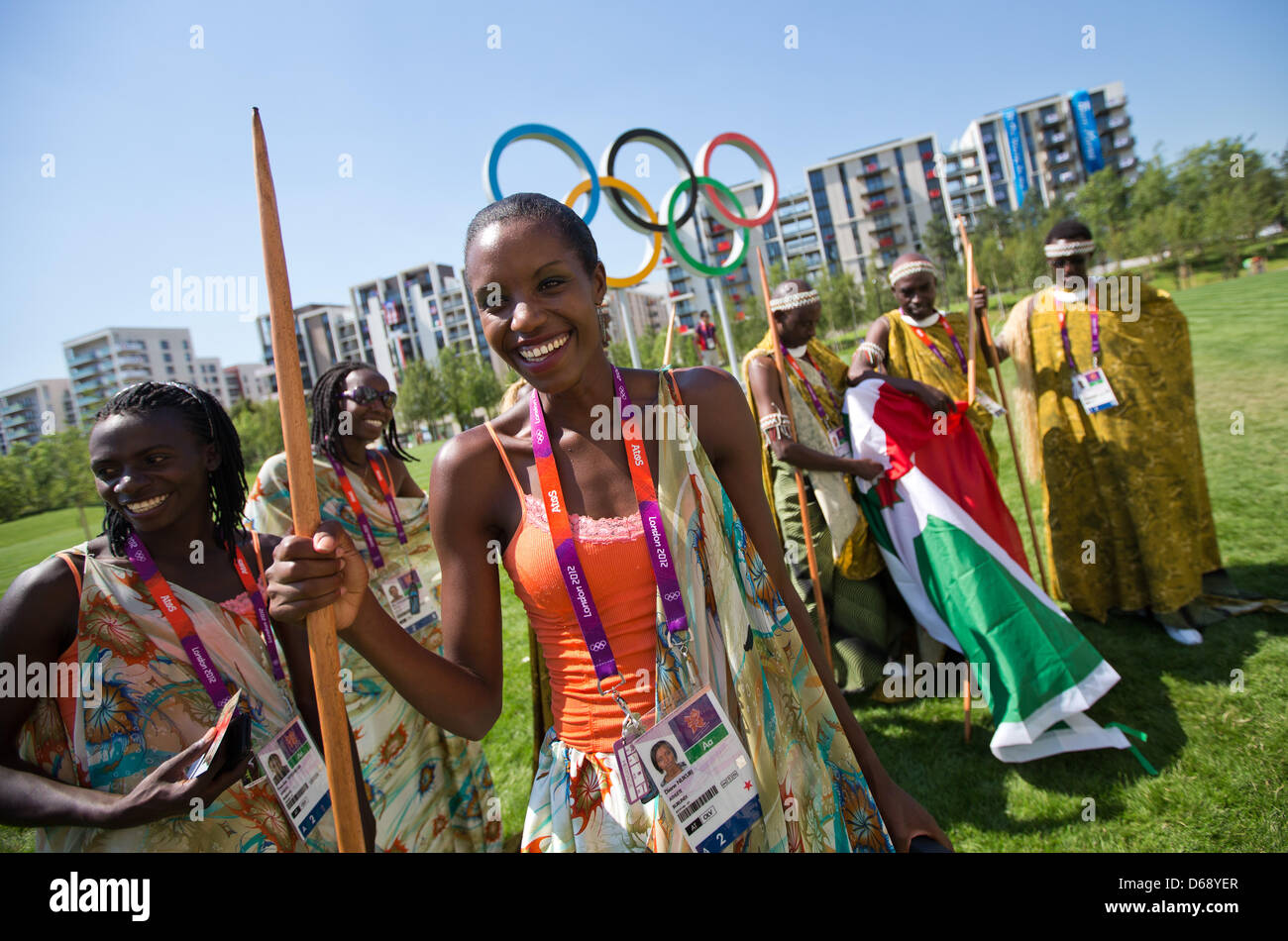Diane Nukuri (C) of Burundi poses in front of the Olympic rings in the ...