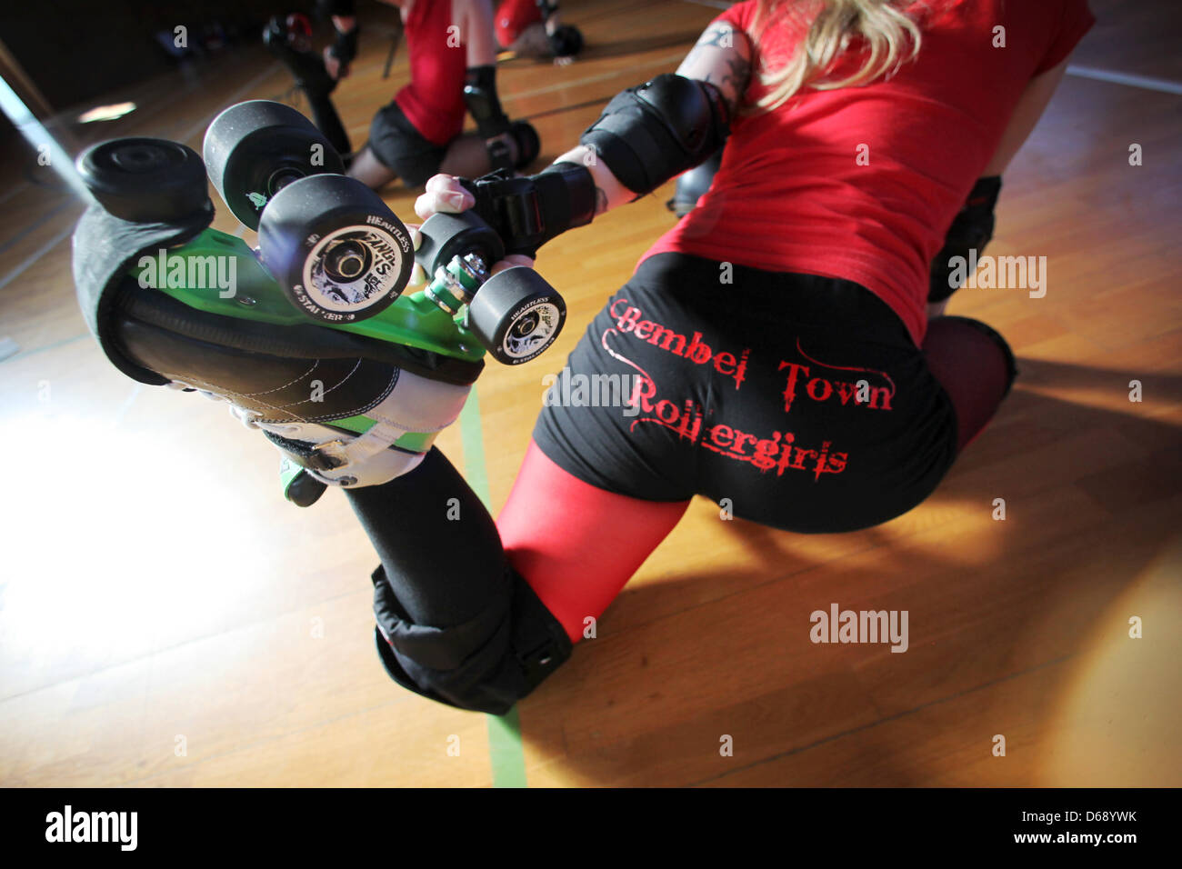 The members of the Bembel Town Rollergirls practice in a gymnasium in ...
