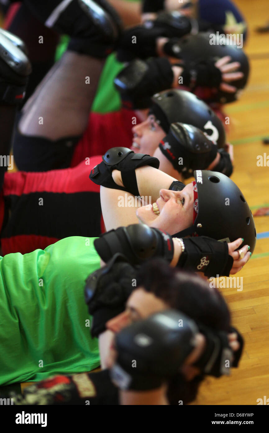 The members of the Bembel Town Rollergirls practice in a gymnasium in ...
