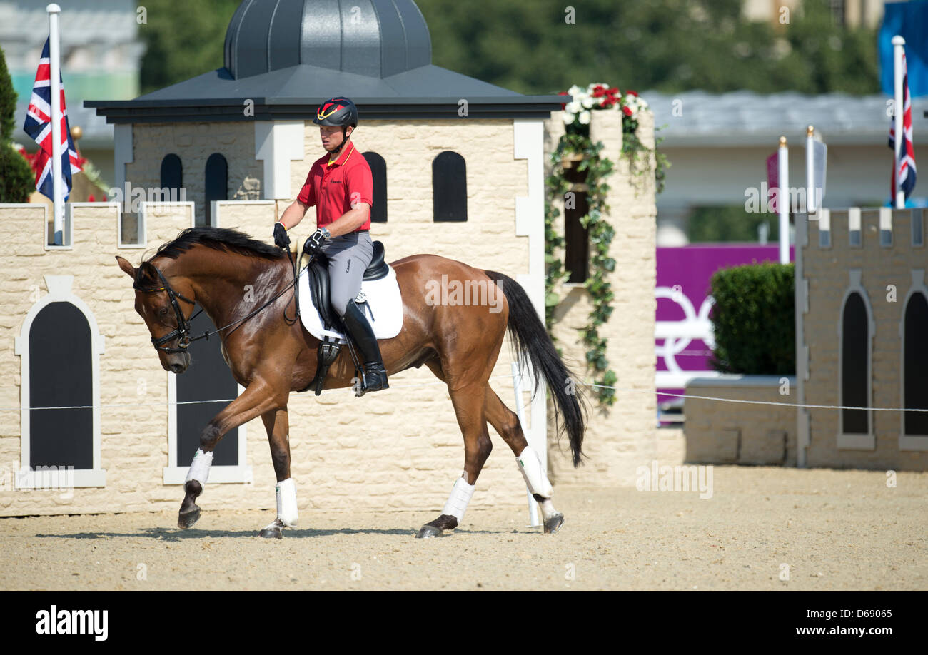 German eventing rider Michael Jung sits on his horse Sam during ...