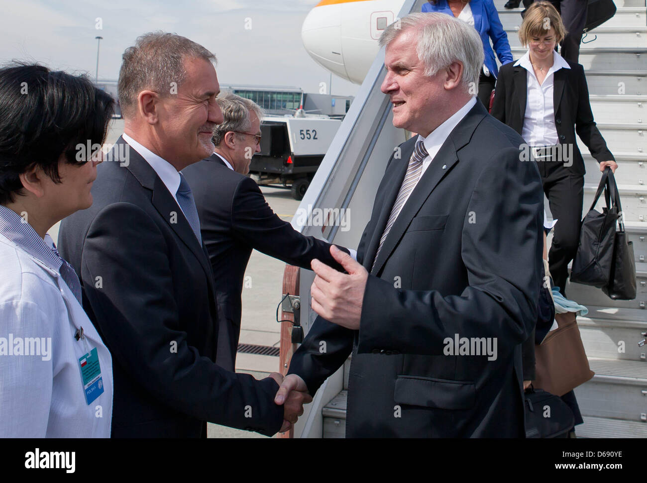 Bavarian Prime Minister and President of the German Bundestag, Horst Seehofer (R), is greeted by ...