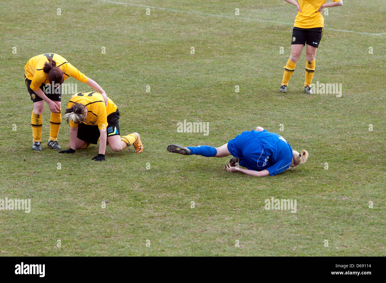 Women`s football at club level, players fallen after collision Stock ...