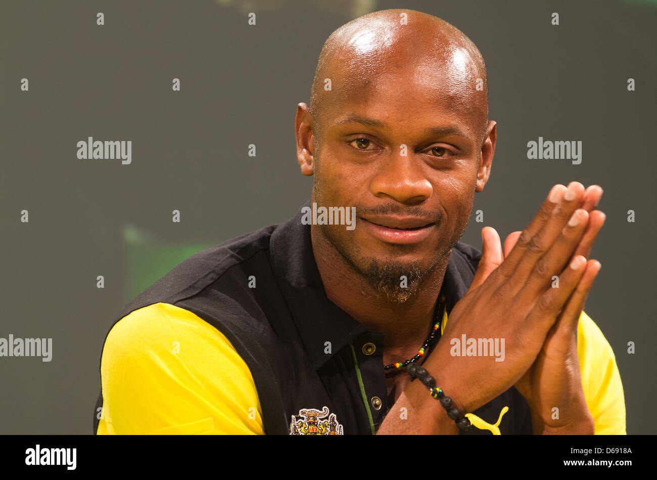 Asafa Powell of Jamaica speaks during a press conference in London ...