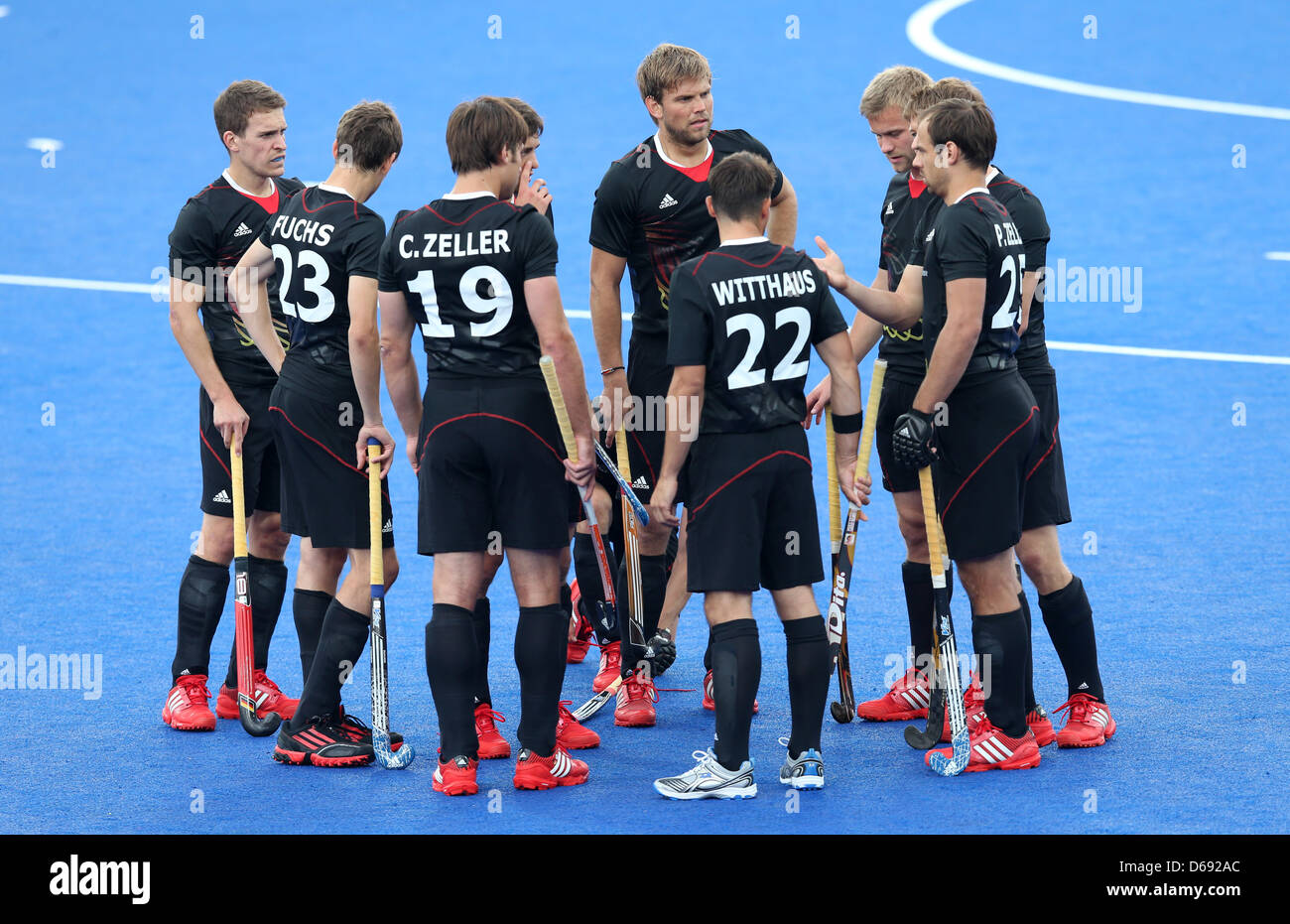 Players of the German Hockey team stand together before a test match in ...