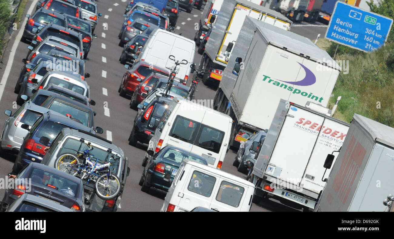 Cars and trucks are stuck in a traffic congestion on Motorway A2 near ...