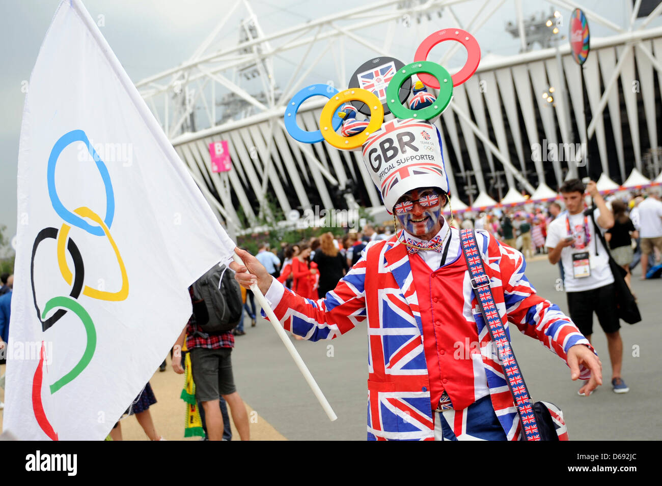 A spectator poses in the Olympic Park prior the Opening Ceremony of the ...