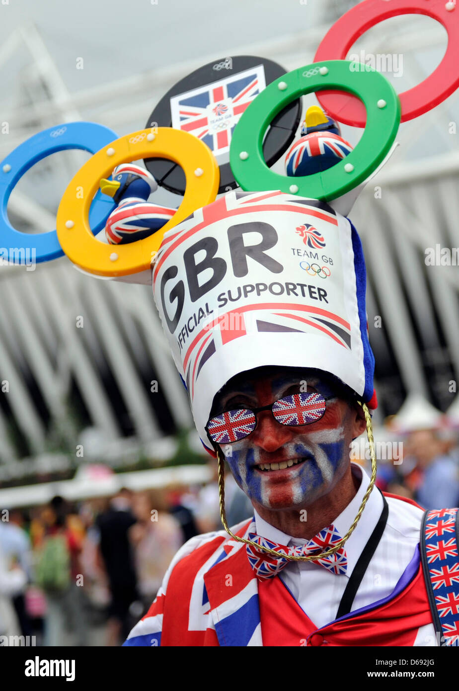 A spectator poses in the Olympic Park prior the Opening Ceremony of the ...