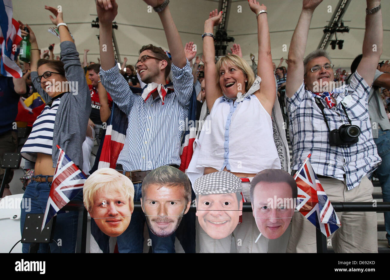 Spectators jubilate before the Opening Ceremony of the London 2012 ...