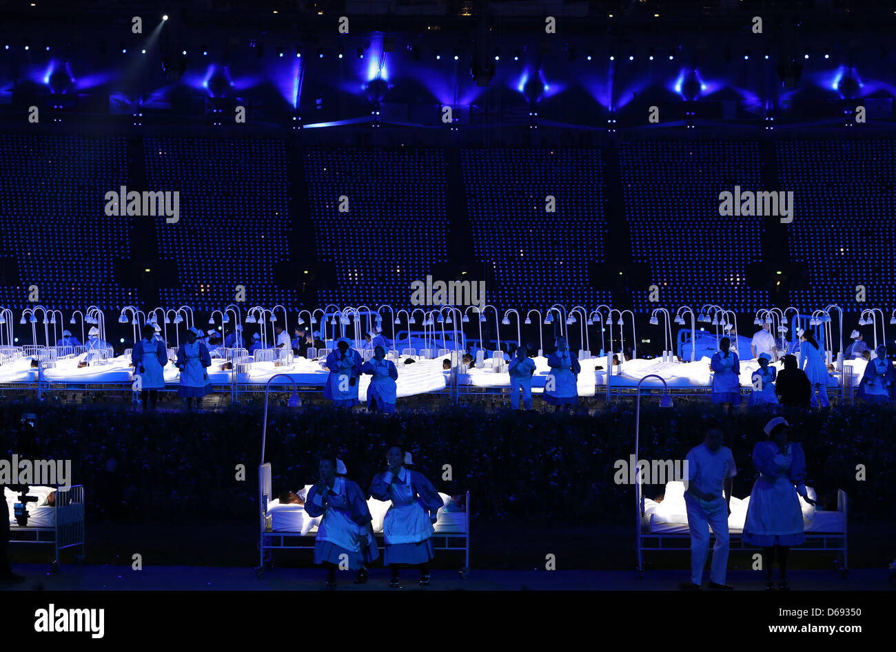 Artists perform during the Opening Ceremony of the London 2012 Olympic ...