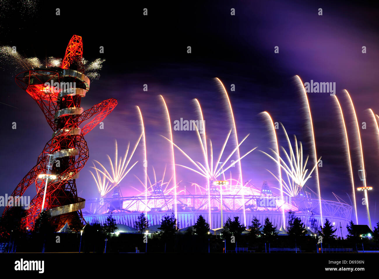 The firework display after the Olympic Flame is lit during the Opening ...