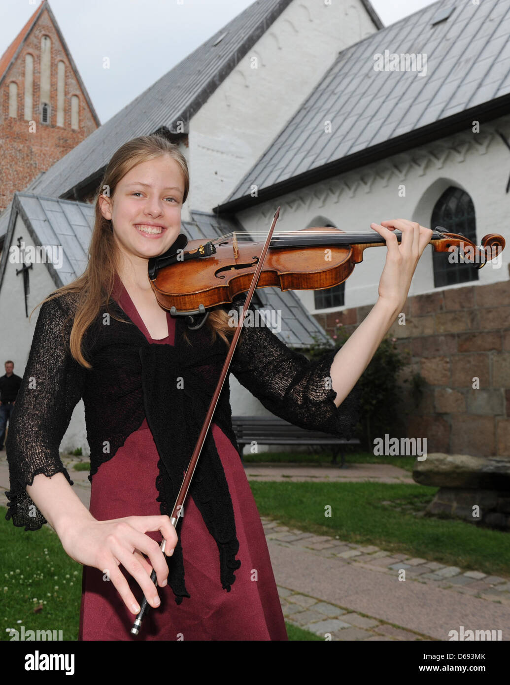 12-year-old Lara Boschkor poses for the camera with a violine of Carlo ...