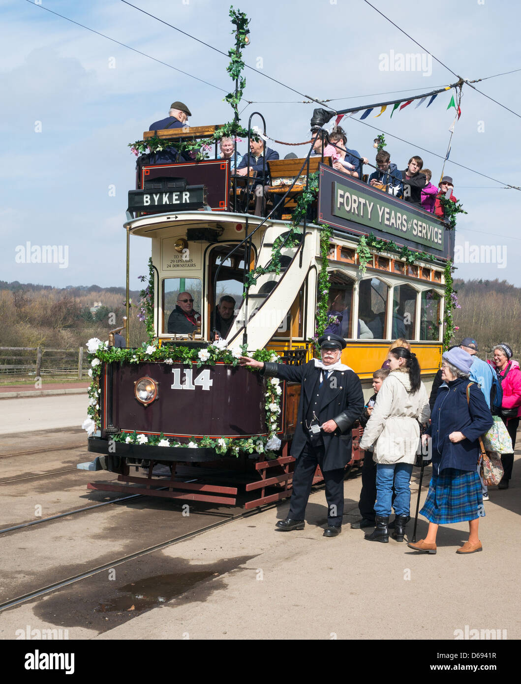 Tram driver directing passengers at Beamish Museum north east England ...