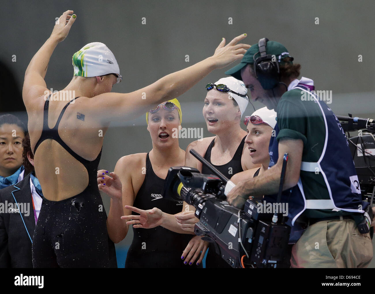 Melanie Schlanger (L) of the Australia and her team mates celebrate ...