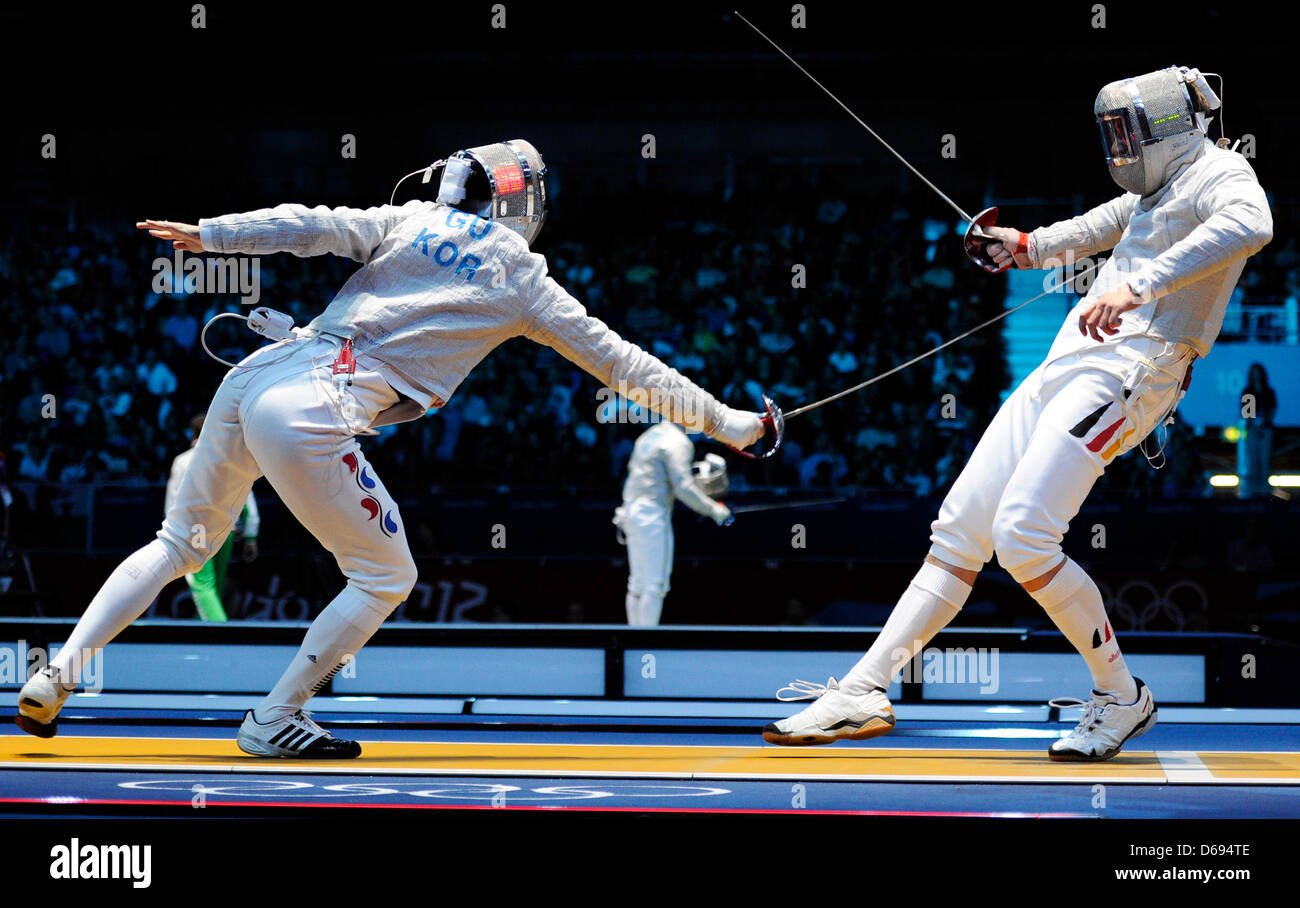 Germany's Max Hartung (R) competes with South Korea's Gu Bongil during ...