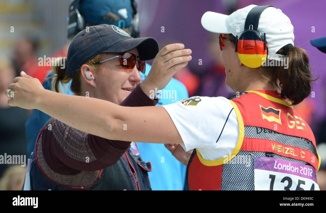 Gold medalist Kimberly Rhode (L) of USA and Germany's Christine Wenzel ...