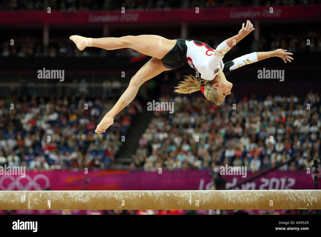 German gymnast Elisabeth Seitz performs on balance beam during women's ...