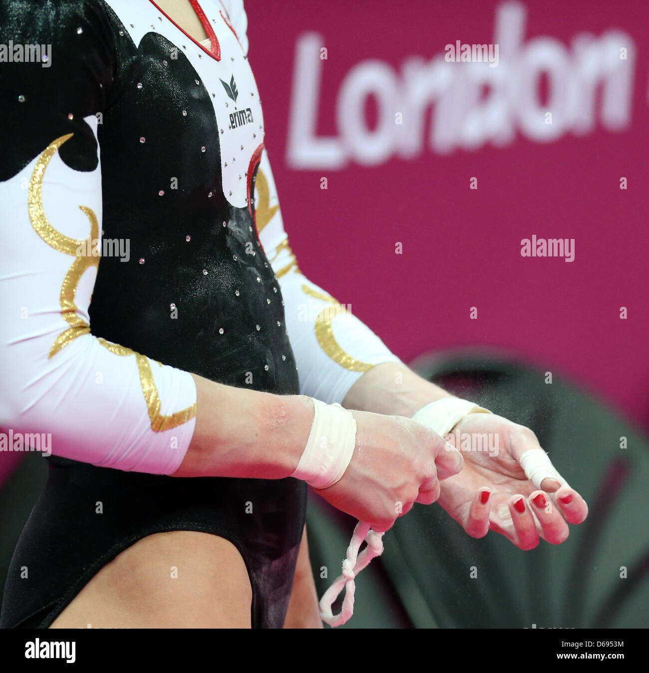 Germany's gymnast Janine Berger prepares before performing on the ...