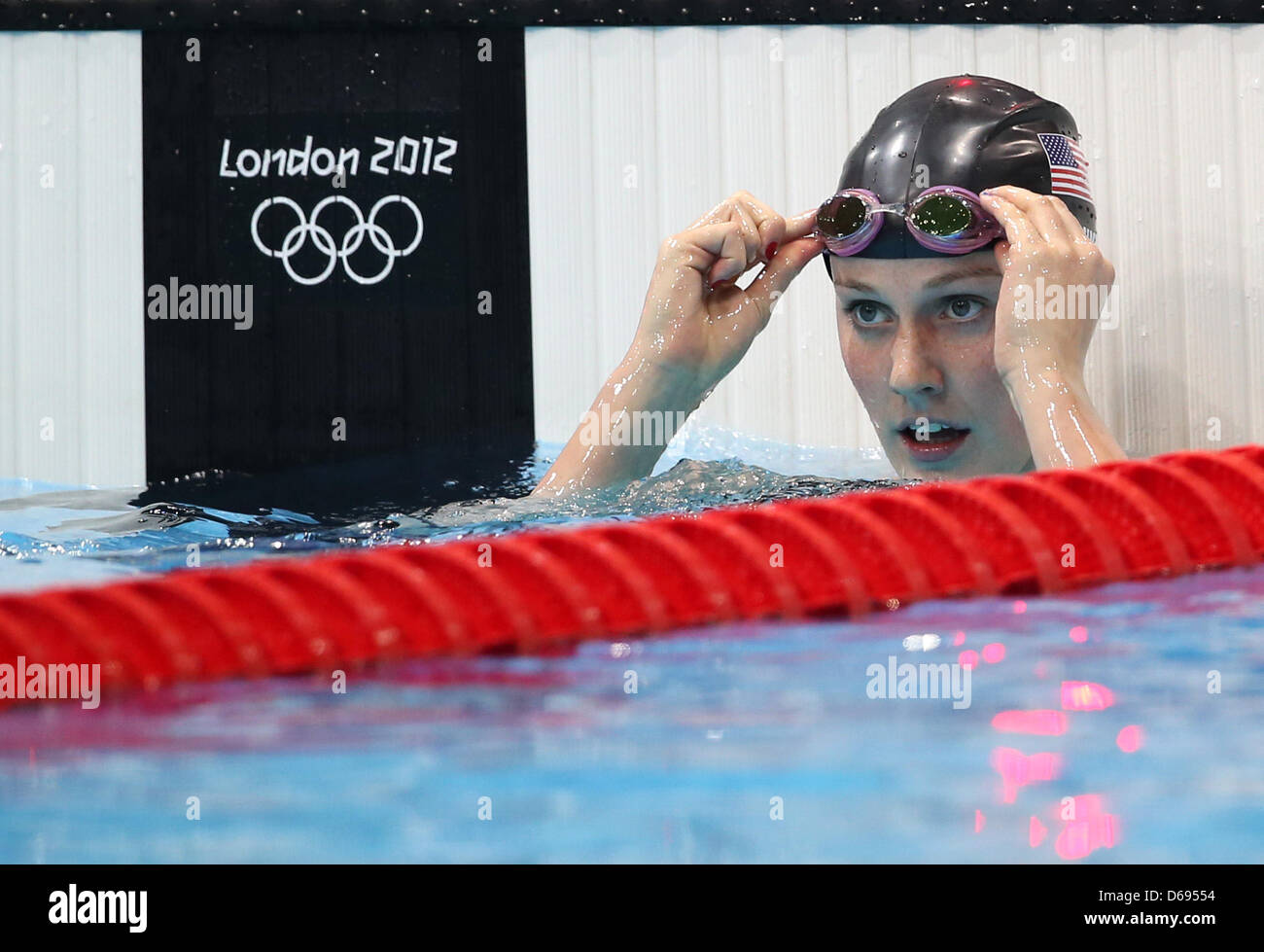 US swimmer Missy Franklin looks at the timeboard after the women's 100m ...