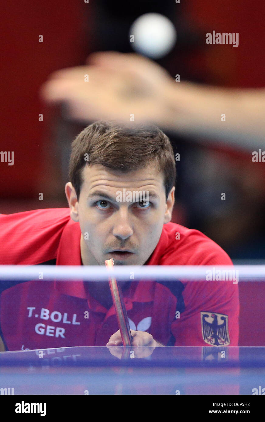 Germany's Timo Boll in action against Noshad Alamiyan of Iran during ...