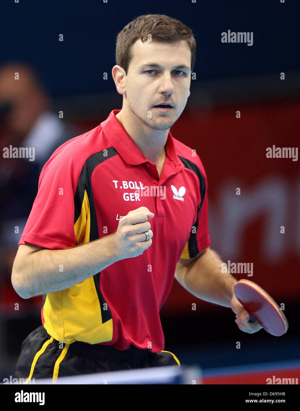 Germany's Timo Boll celebrates during the game against Noshad Alamiyan ...