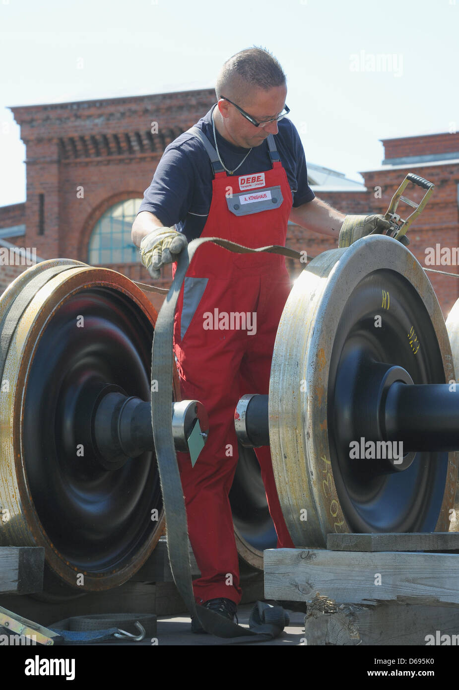 Repaired sets of wheels are loaded at the DB (German Federal Railway ...