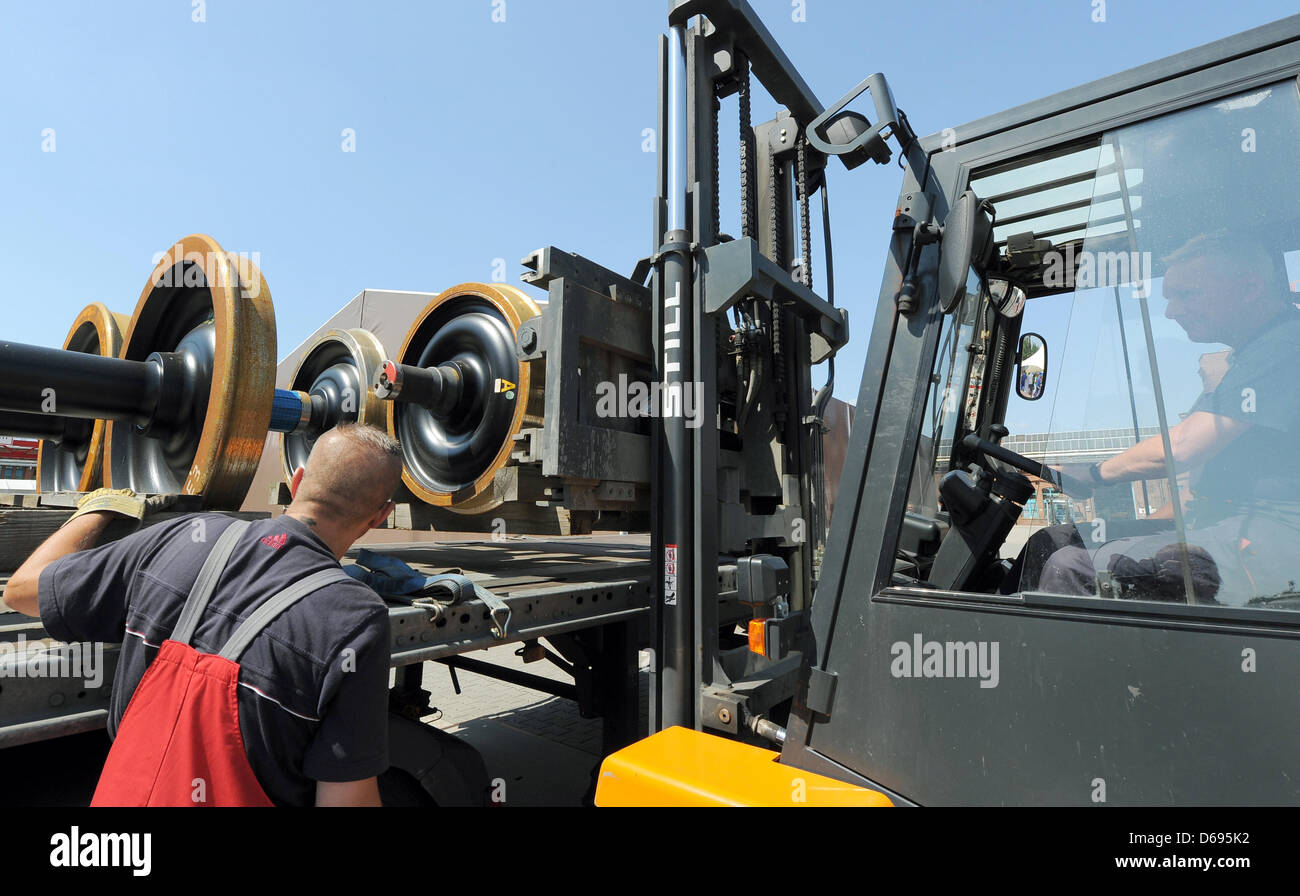Repaired sets of wheels are loaded at the DB (German Federal Railway ...