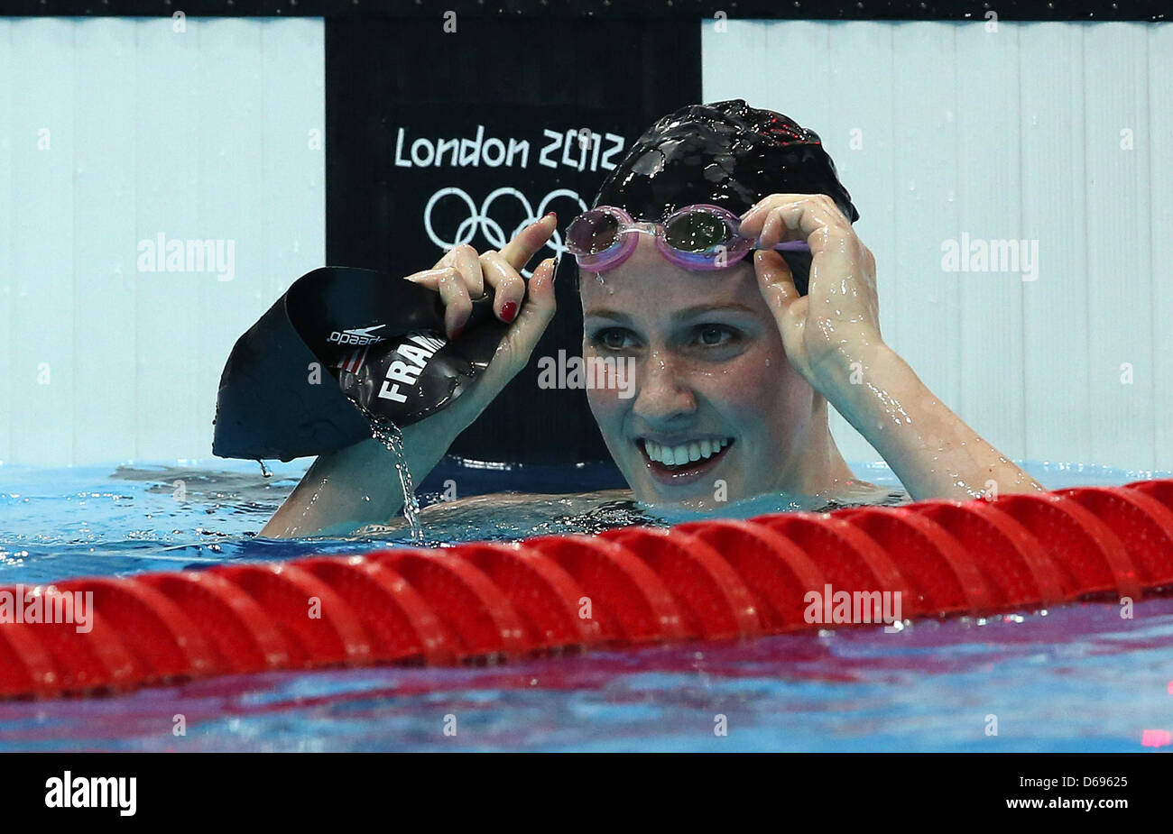 Missy Franklin of the US smiles after competing in the women's 100m ...