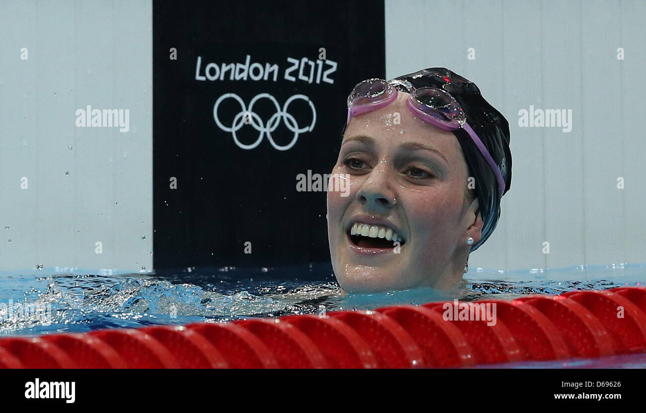 Missy Franklin of the US smiles after competing in the women's 100m ...