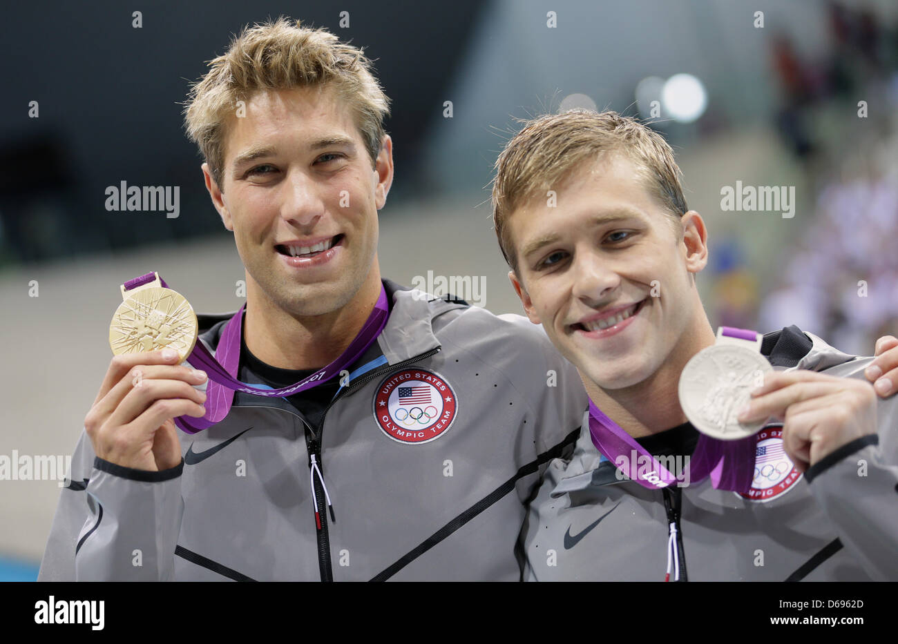 Gold medalist Matthew Grevers (L) and silver medalist Nick Thoman of ...