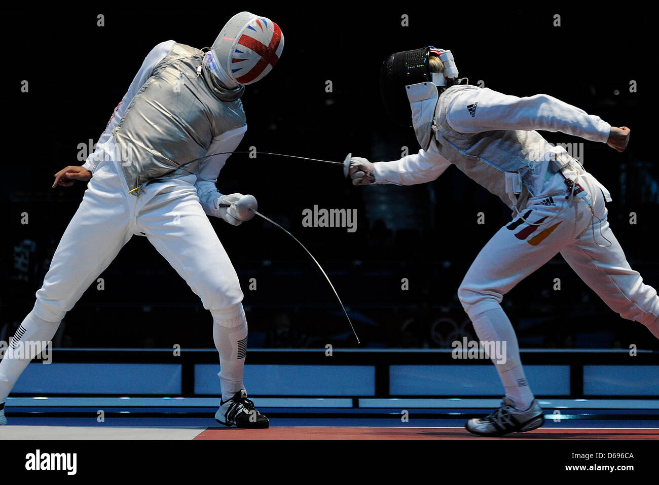 Germany's Peter Joppich (R) competes with Great Britain's James-Andrew ...