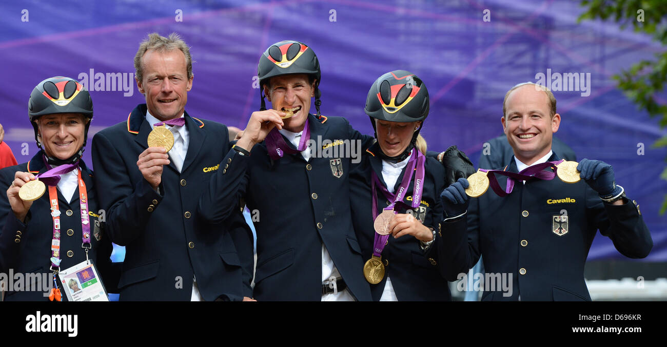 Germany's eventing team (L-R) , Ingrid Klimke, Peter Thomsen, Dirk ...