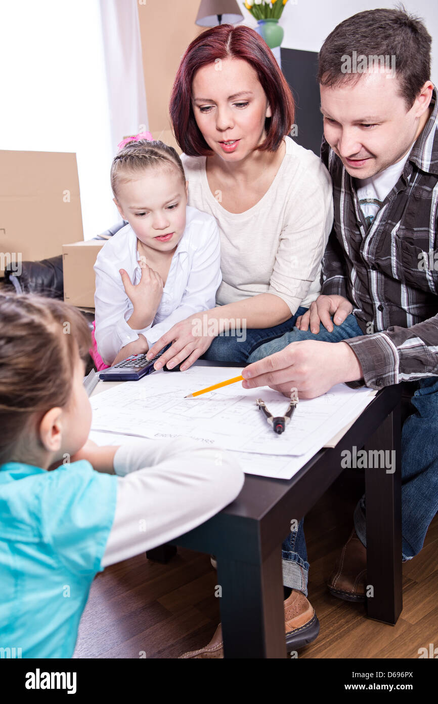 a young family by planning of a new home Stock Photo - Alamy
