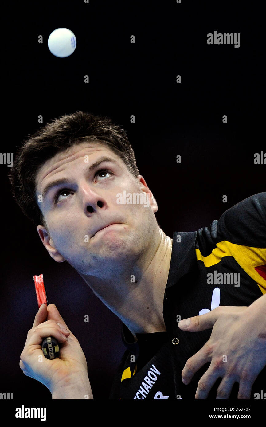 Germany's Dimitrij Ovtcharov competes with Denmark's Maze during the ...
