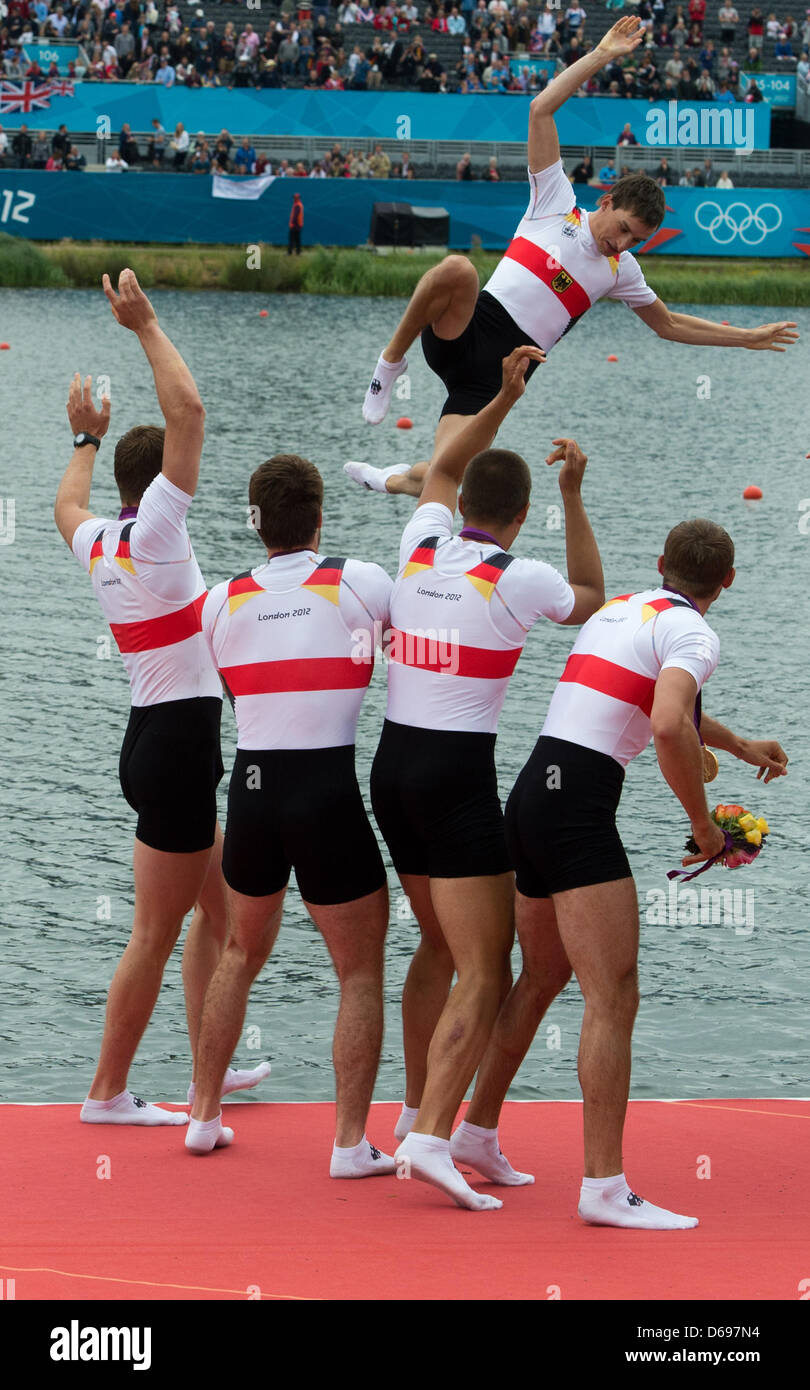 Team with Martin Sauer (top) of Germany celebrate after winning the Men ...