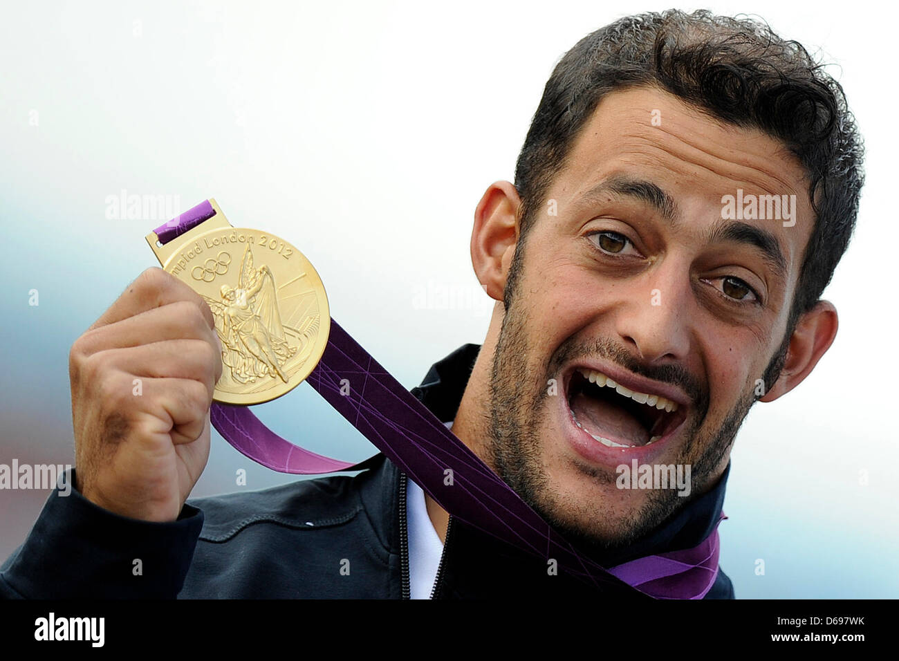 Daniele Molmenti of Italy poses with his gold medal after the Canoe ...