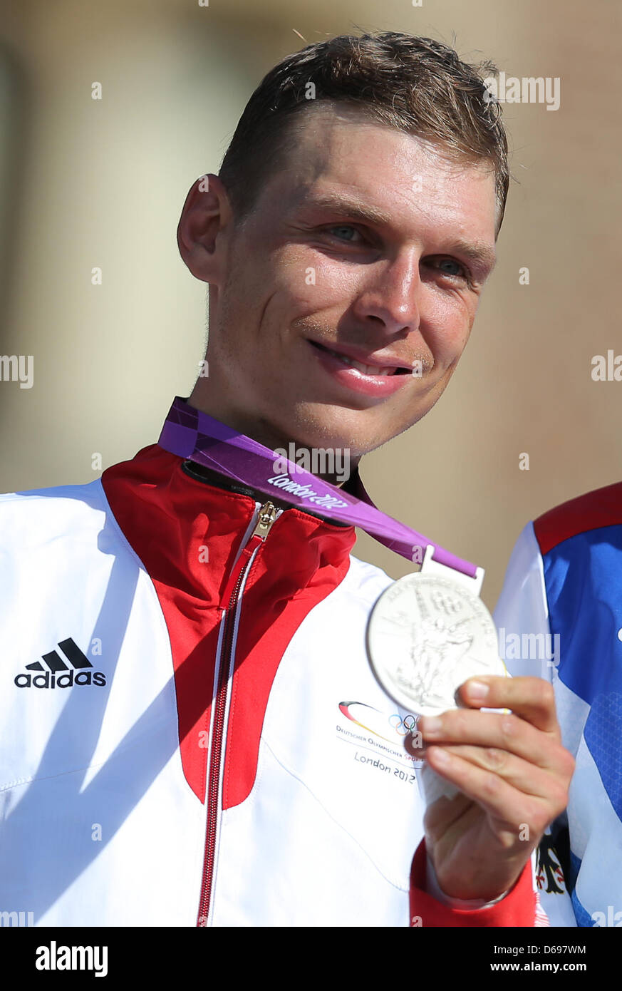 Germany's Toni Martin stands on the podium after receiving the silver ...