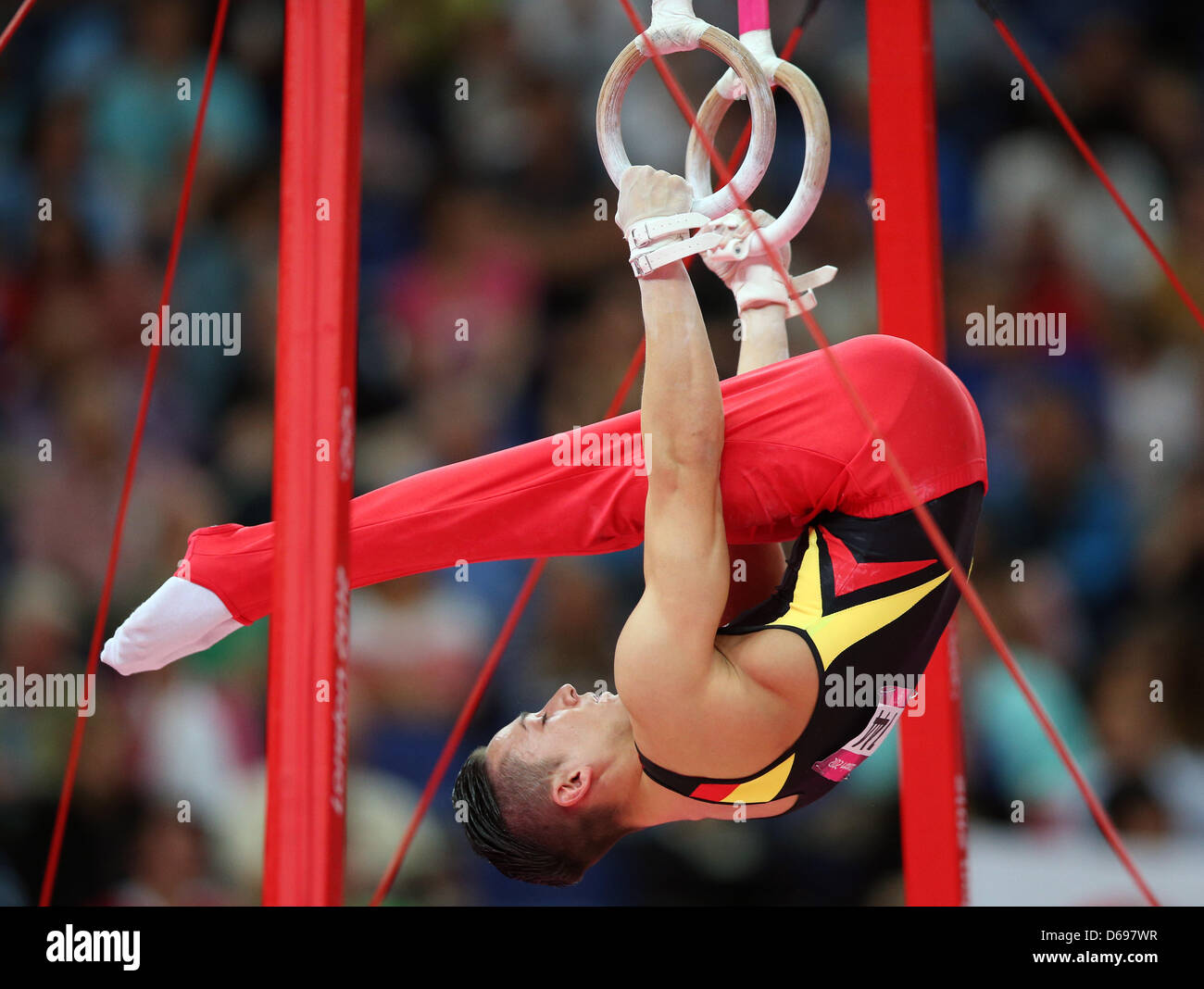 Germany's Marcel Nguyen competes on the rings in the Men's Individual ...