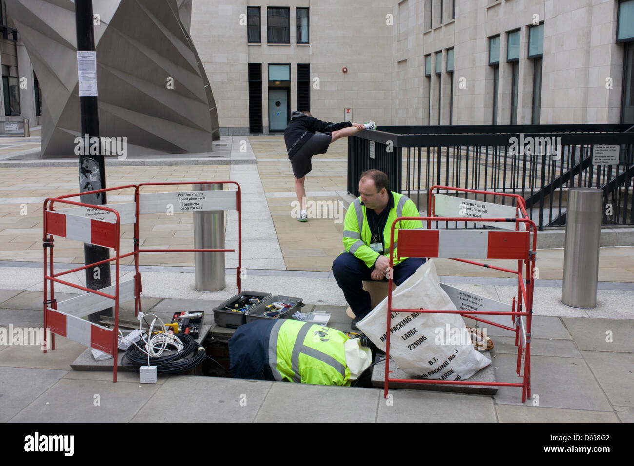 Workmen on sidewalk hi-res stock photography and images - Alamy