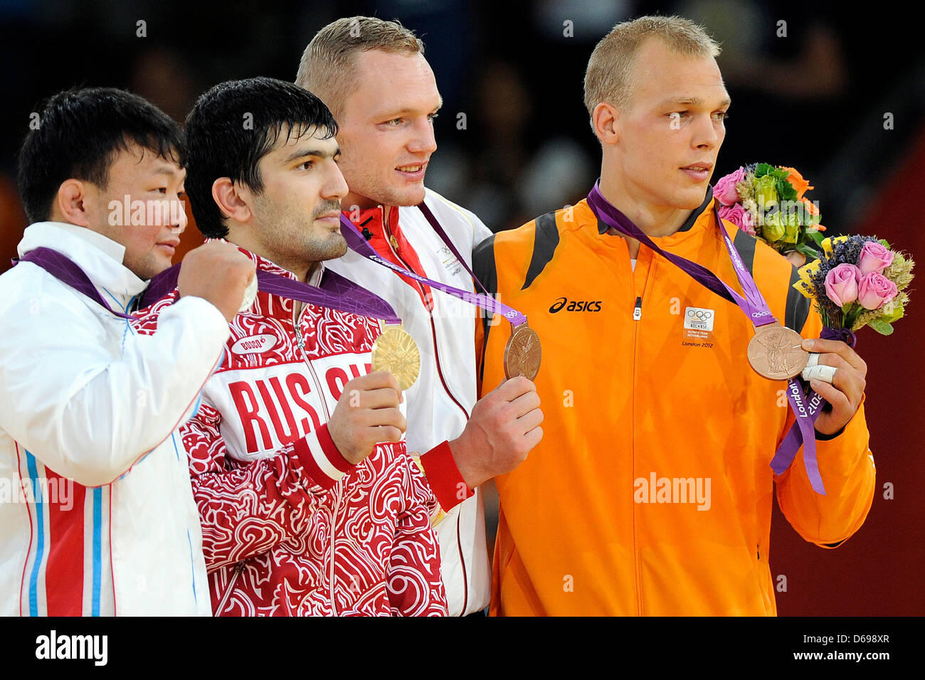 Mongolia's silver medalist Tuvshinbayar Naidan, Russia's gold medalist ...
