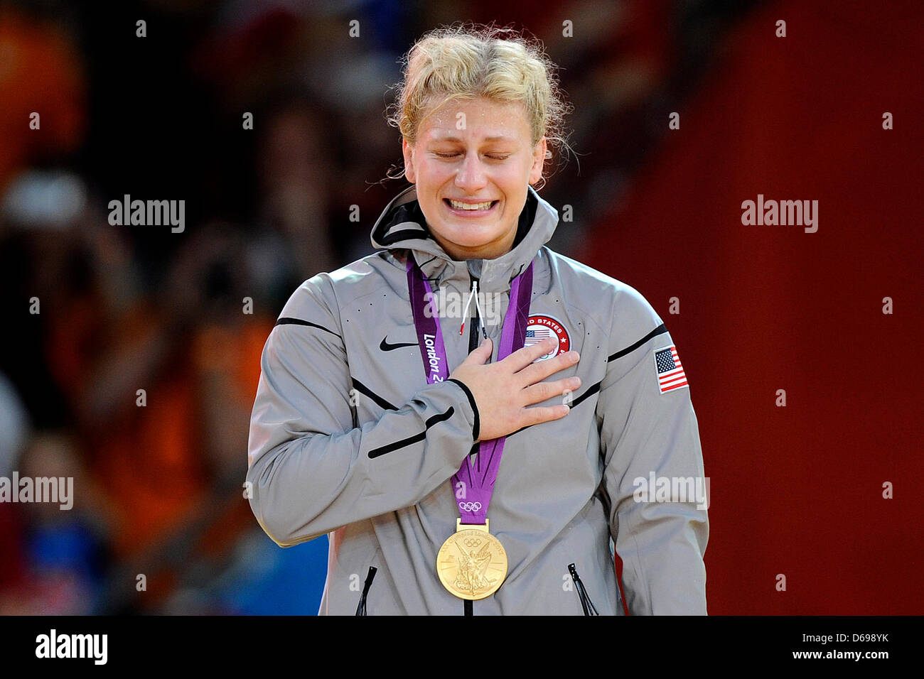 Gold medalist Kayla Harrison of the United States cries during the ...